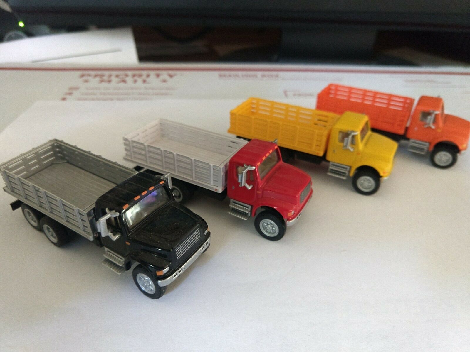 4 Boley HO Scale International Stake Bed Trucks | #20660510